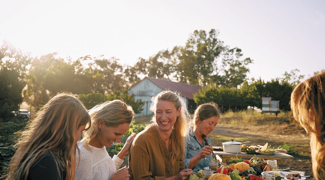 Elizabeth-Poett-and-friends-at-ranch-table - Cowboys and Indians Magazine